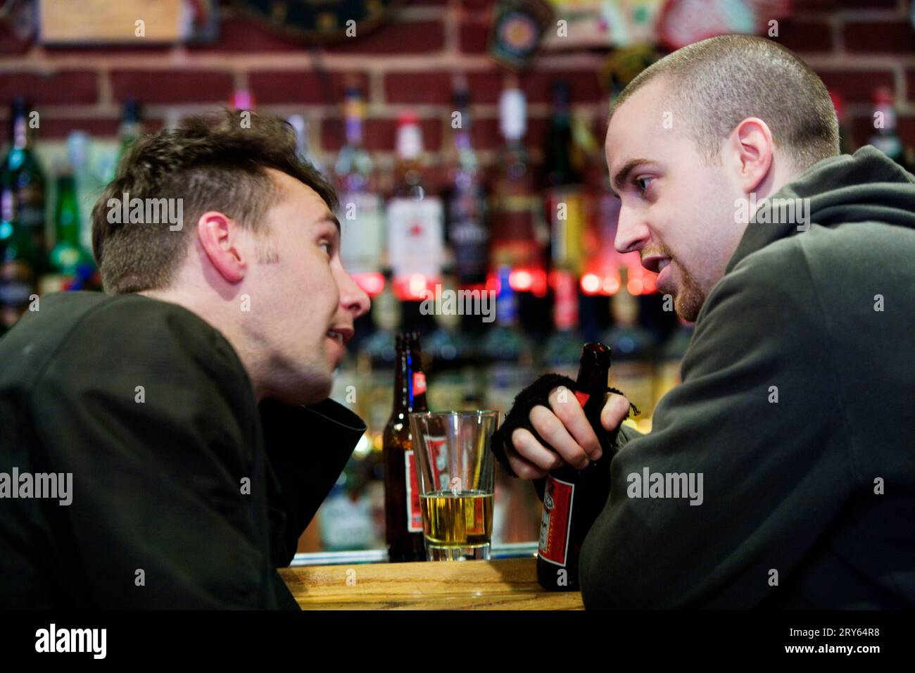Two seated men hi-res stock photography and images - Alamy