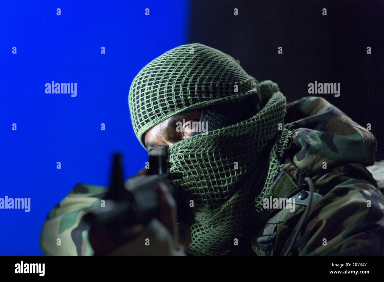 A soldier pointing a gun Stock Photo - Alamy