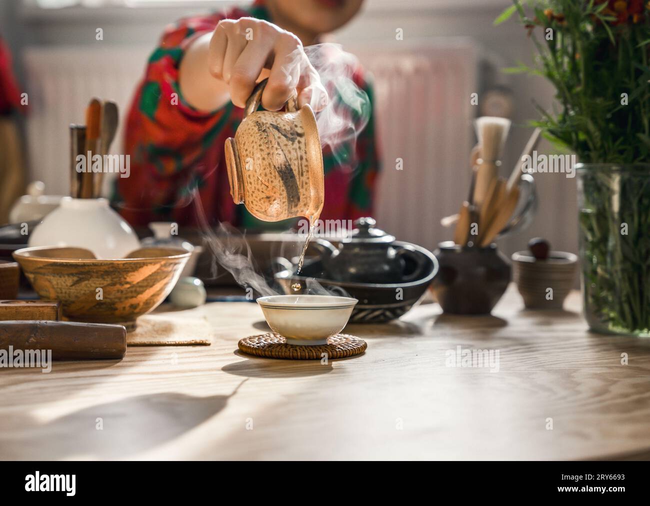 Steaming Tea Being Poured Into A Cup During Tea Ceremony Stock Photo ...
