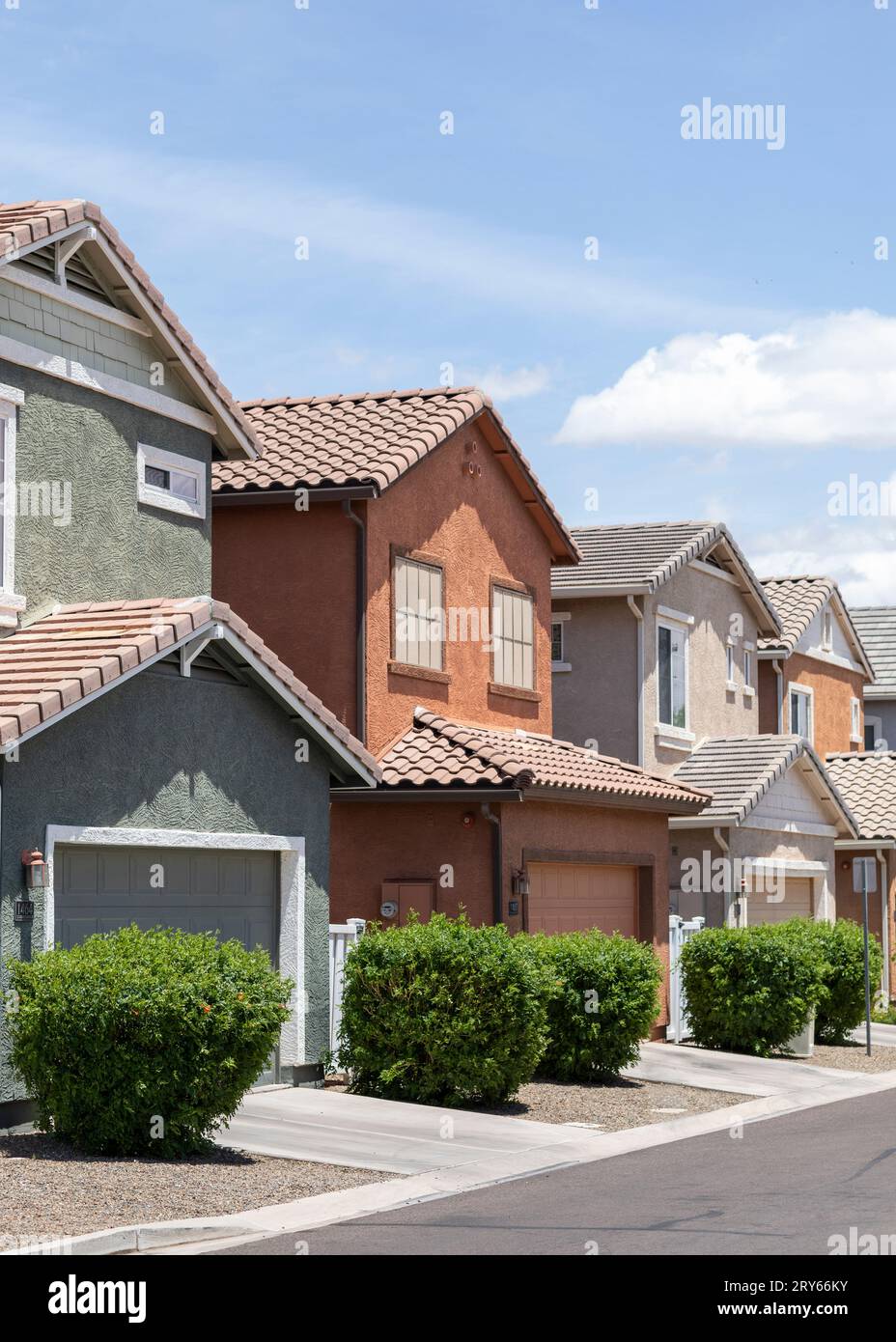 Row of similar houses painted different slightly colors vertical Stock ...