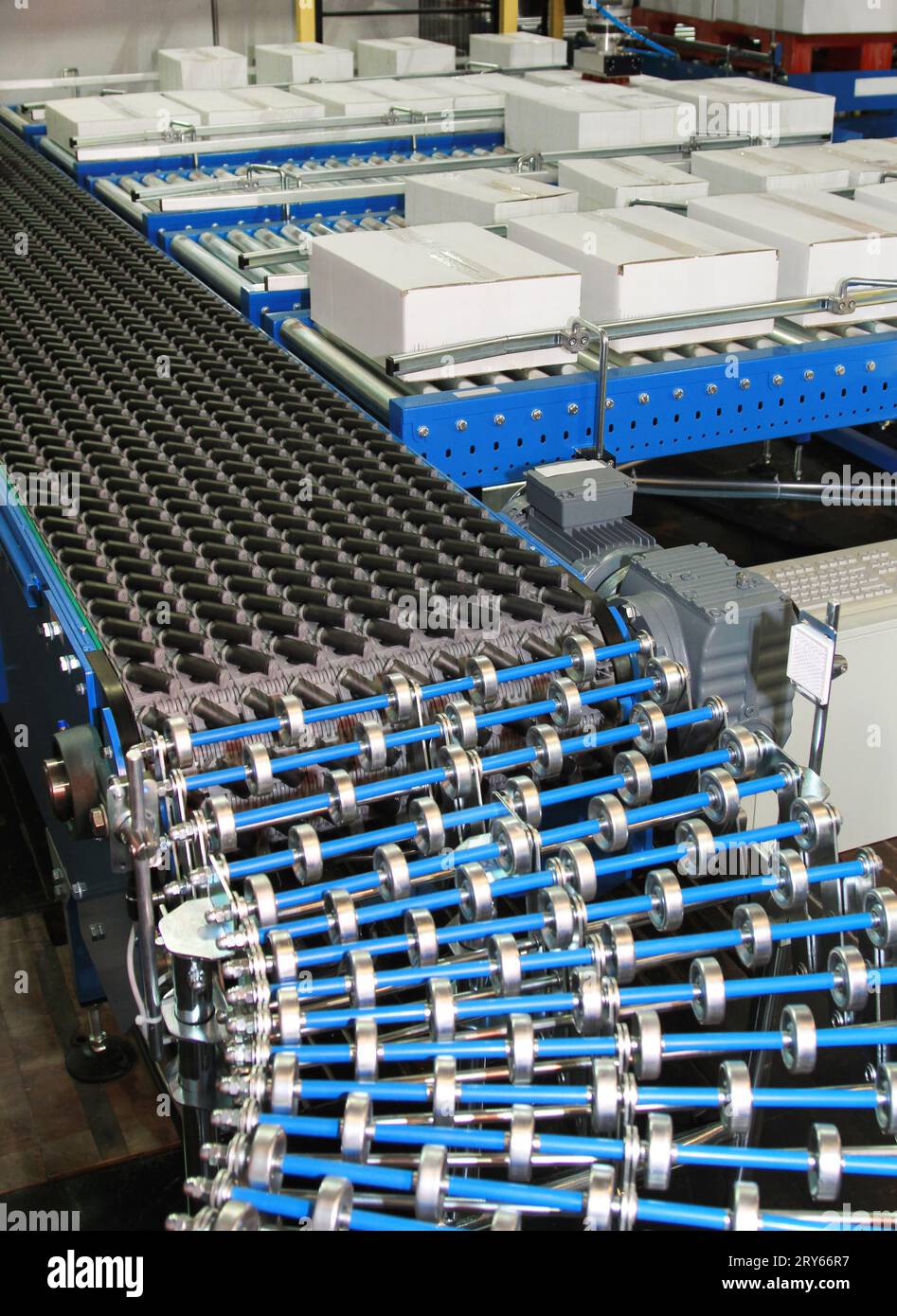 Flexible Conveyor Rollers at Box Packing Line in Factory Stock Photo ...