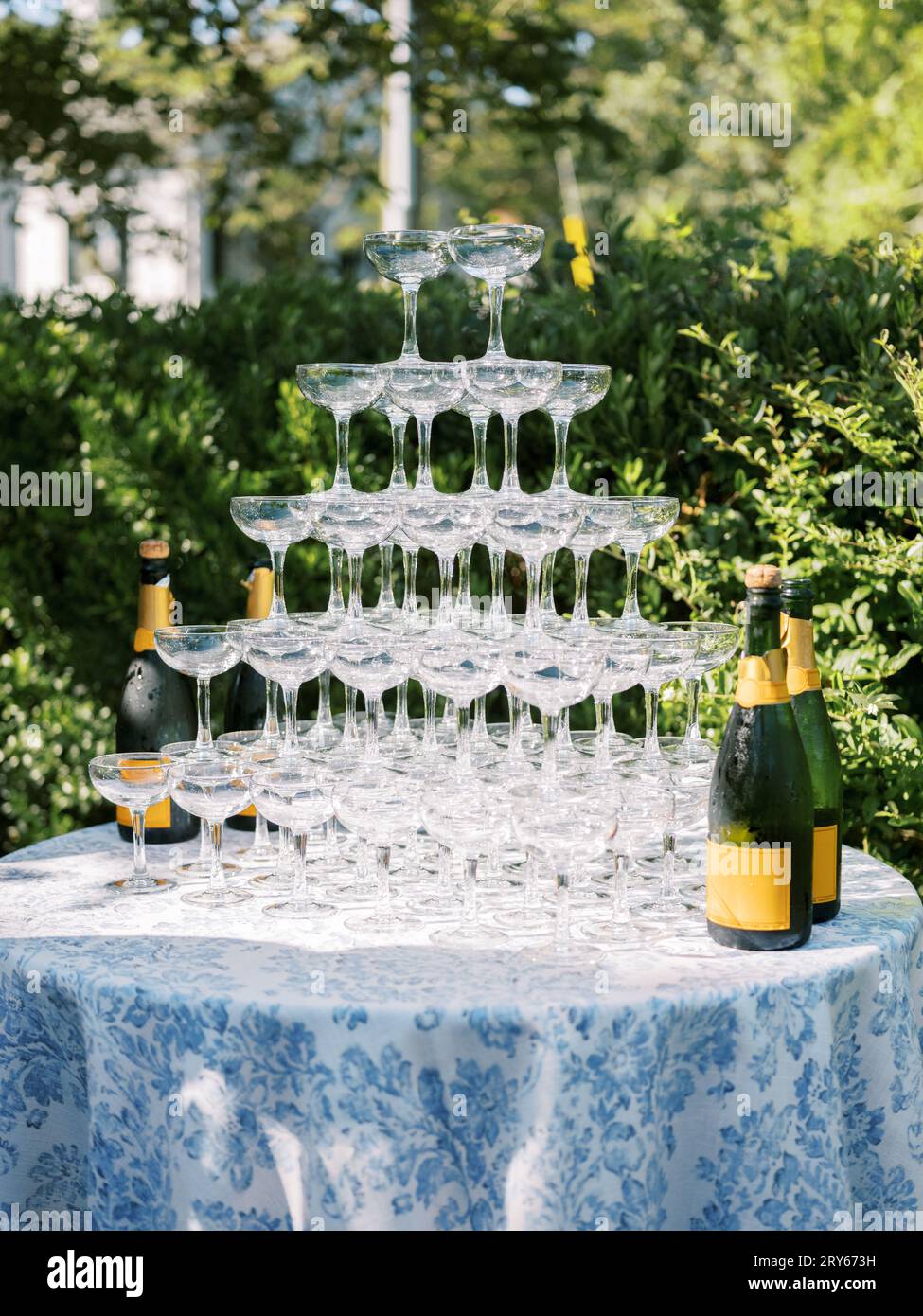 Crystal coupes for a champagne tower Stock Photo - Alamy