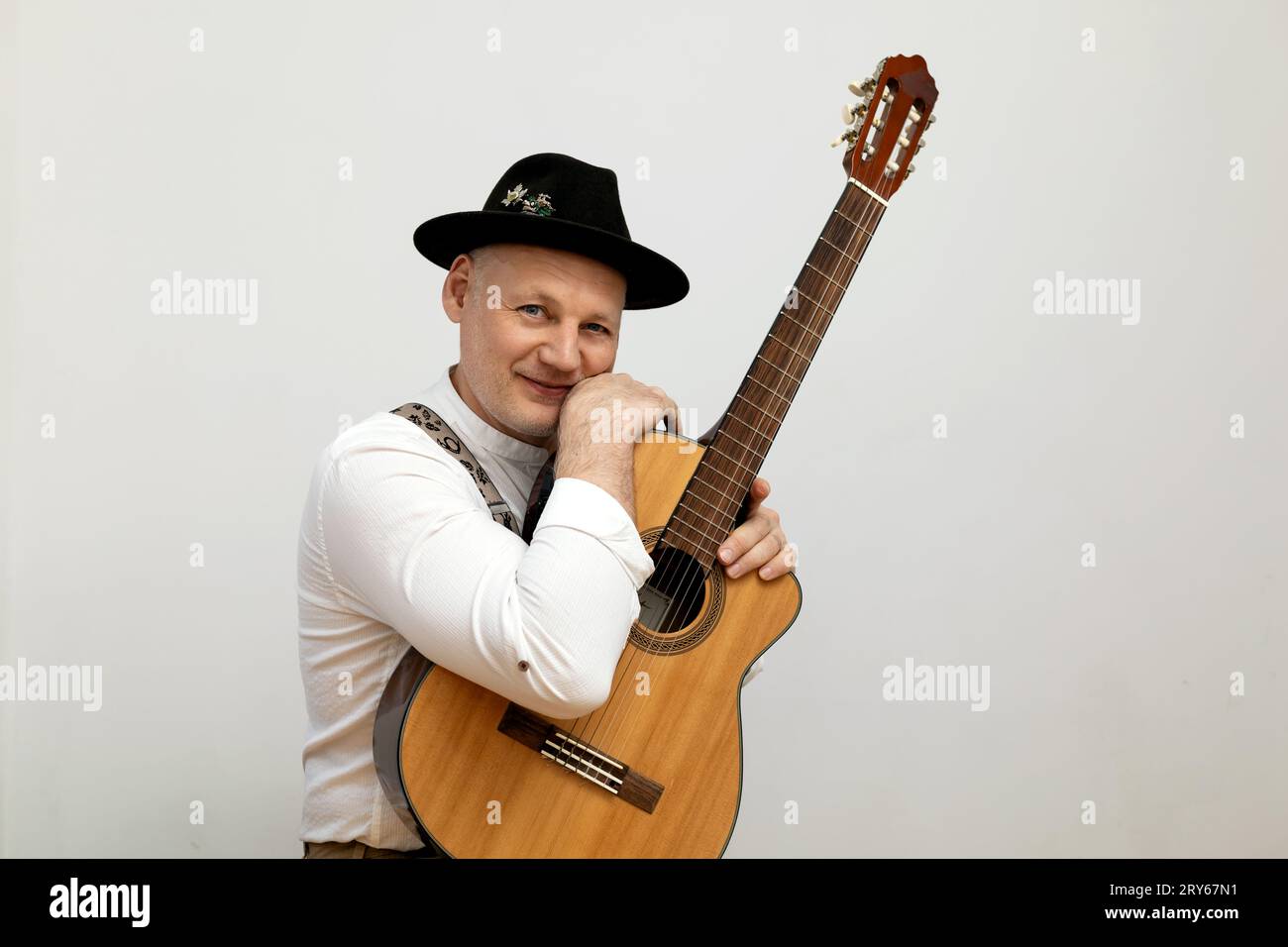 Smiling man play guitar happy hi-res stock photography and images - Alamy