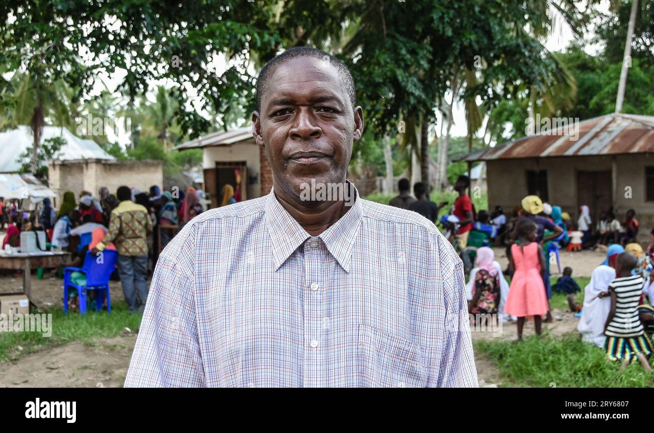 Tanzanian man poses for a picture during the health and nutrition ...