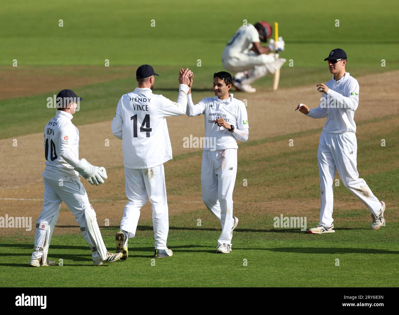 Hampshire's James Vince and Mohammad Abbas celebrate the wicket of ...