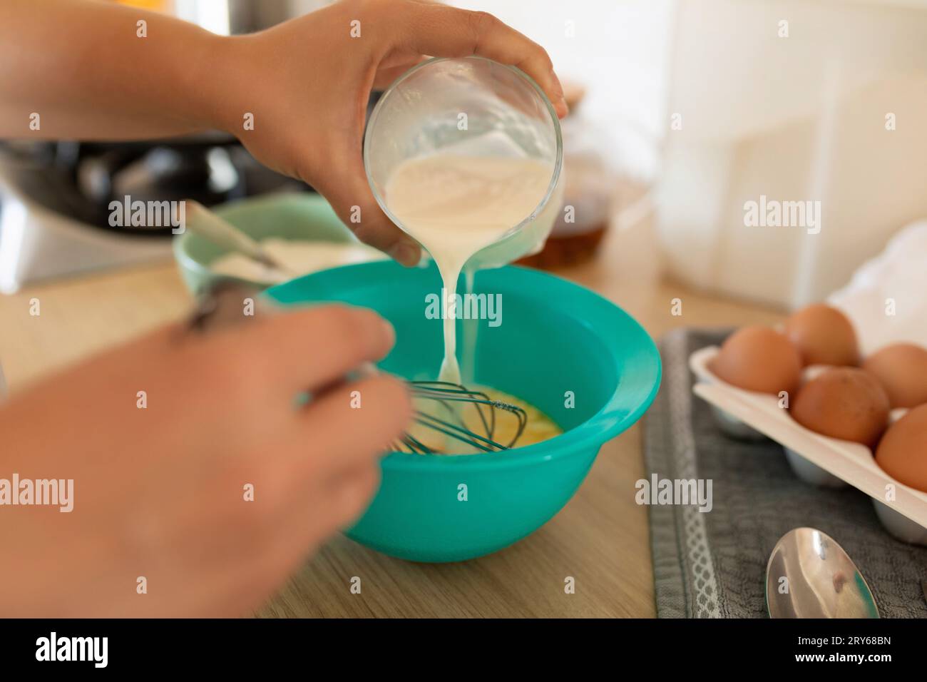 Cooking hands adding flour mixing hi-res stock photography and images ...