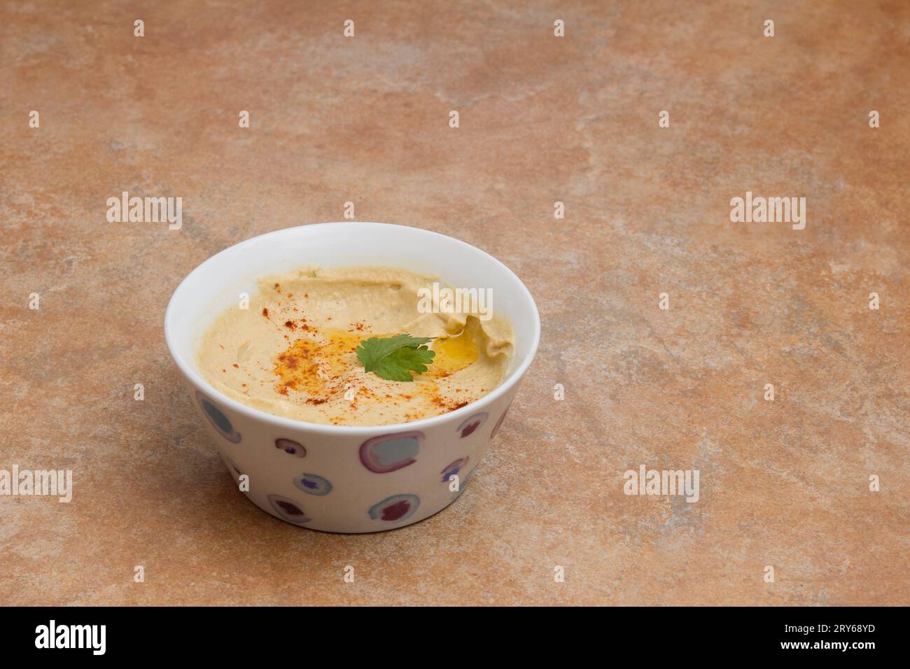 Overhead View of Hummus Dip Decorated with Olive Oil, Paprika, and ...