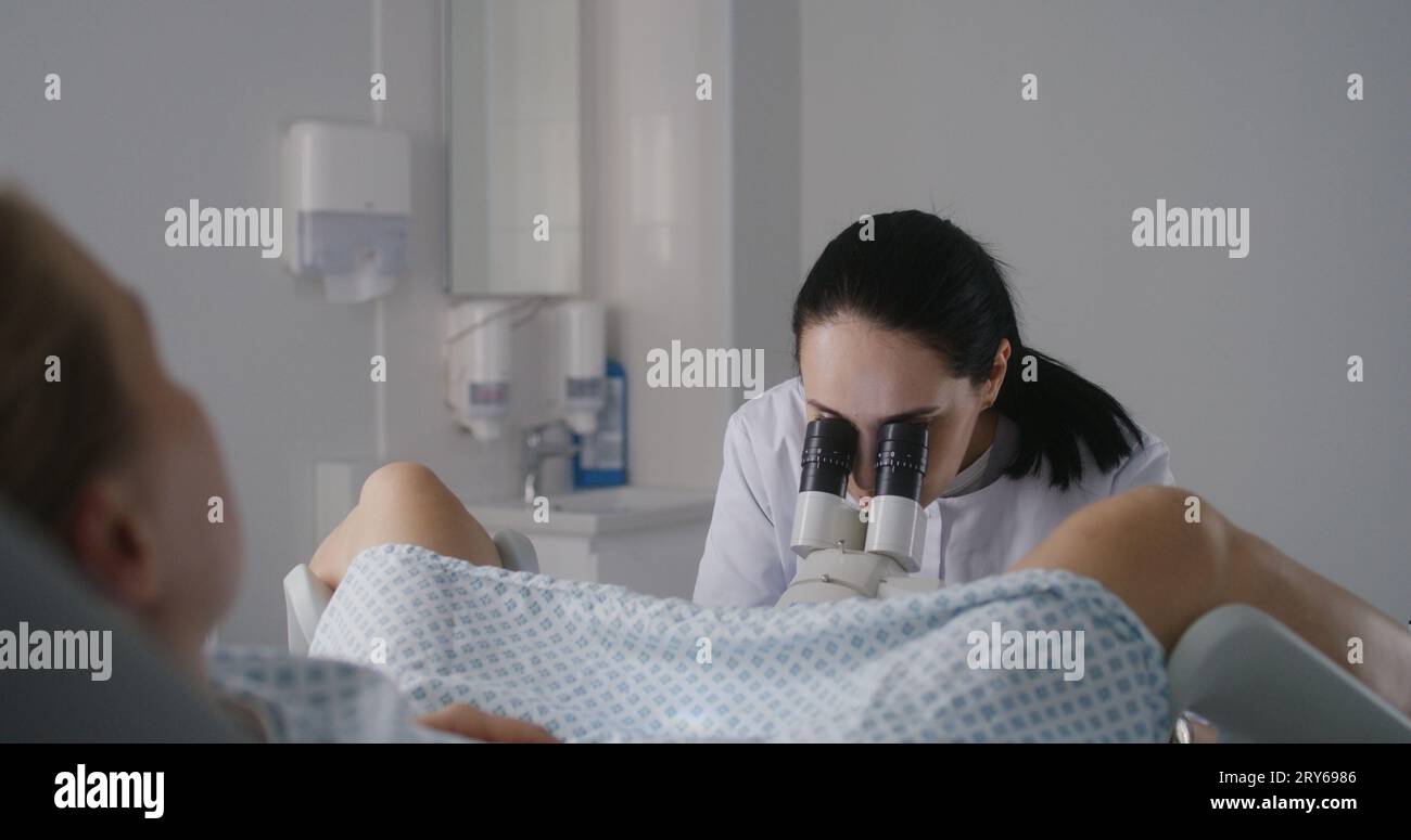 Gynecology Room In Modern Clinic Female Gynecologist Uses Colposcope Takes Tests From Patient