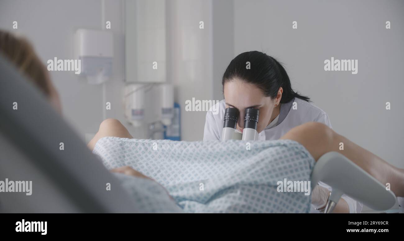 Gynecology Room In Modern Clinic Female Gynecologist Uses Colposcope Takes Tests From Patient