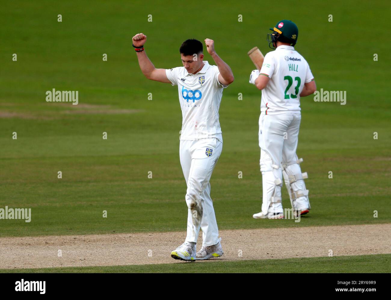 Durham's Matthew Potts celebrates after team-mate Matt Parkinson (not ...