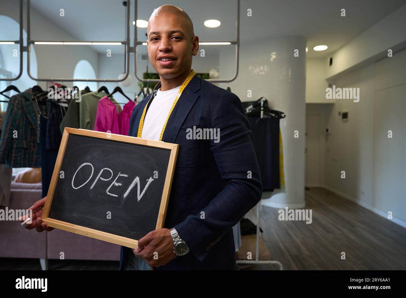 Portrait smiling male tailor hi-res stock photography and images - Alamy