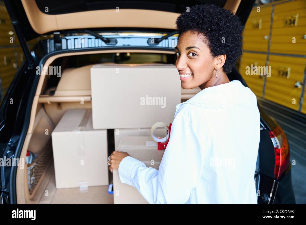 Curly african american woman uses hi-res stock photography and images ...