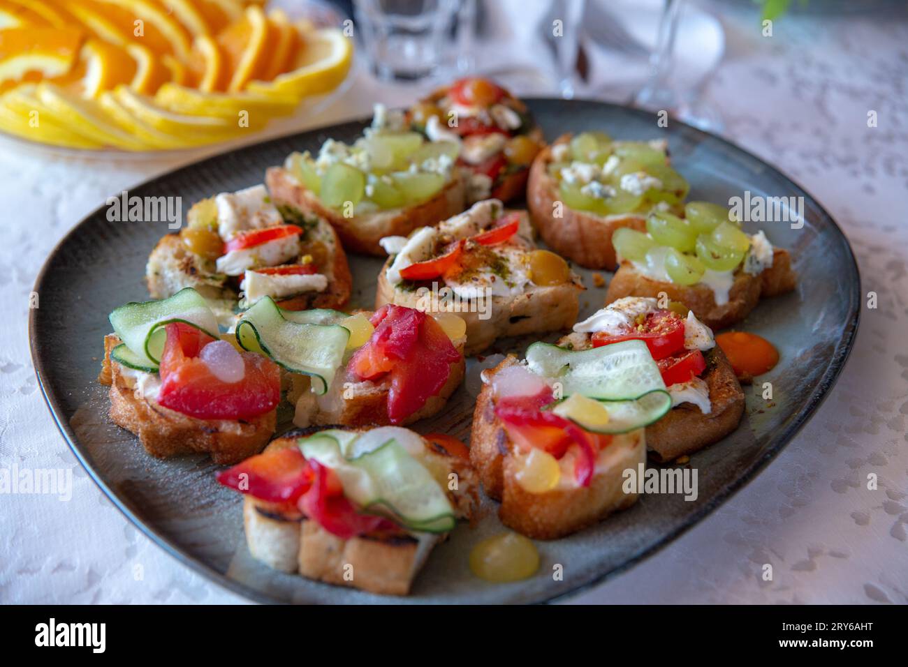 Catering plate. Assortment of snacks on the buffet table. Beautifully ...