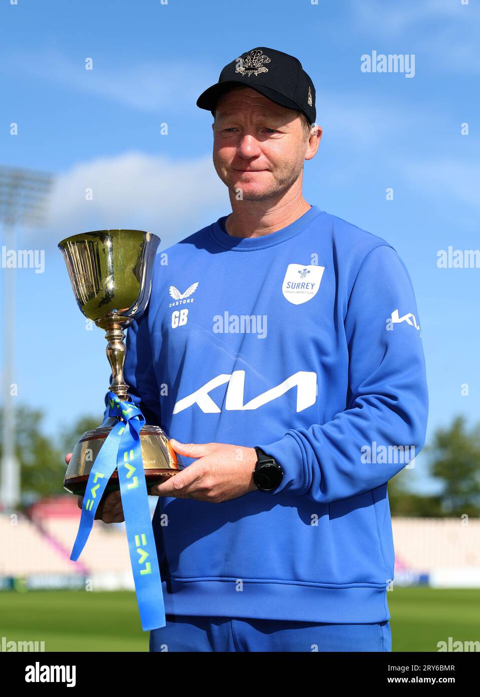 Surrey head coach Gareth Batty poses with the division one trophy after ...