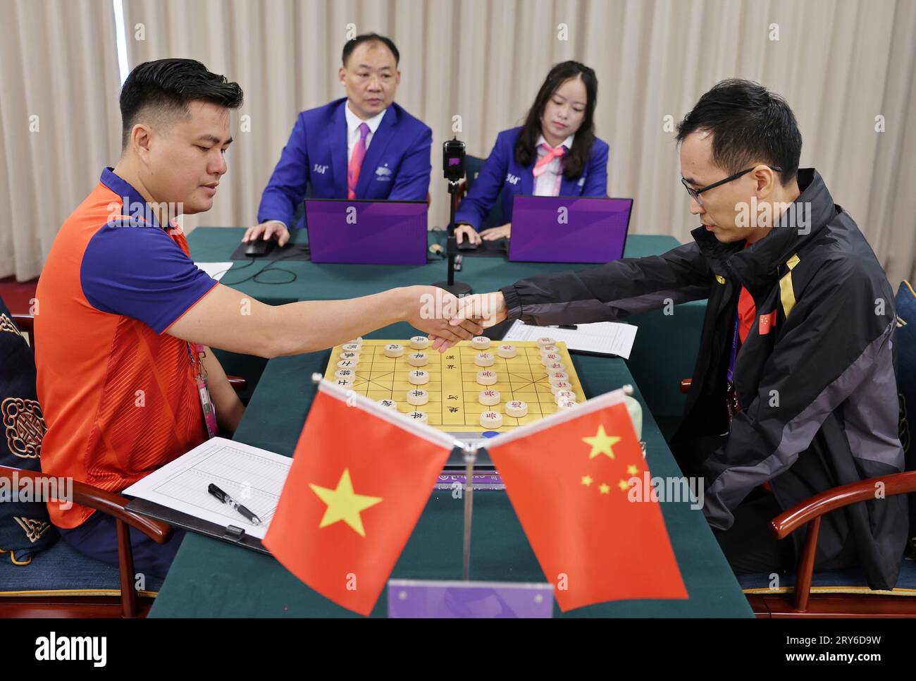 Hangzhou, China's Zhejiang Province. 29th Sep, 2023. Zhao Xinxin (R) of ...