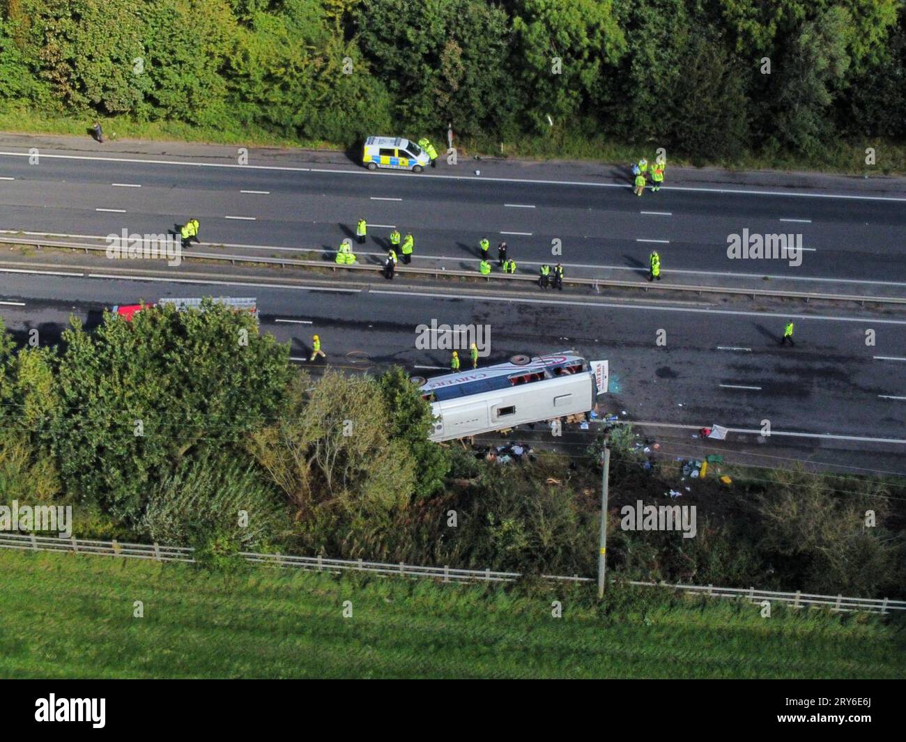 Emergency services at the scene of a coach crash on the M53 motorway ...