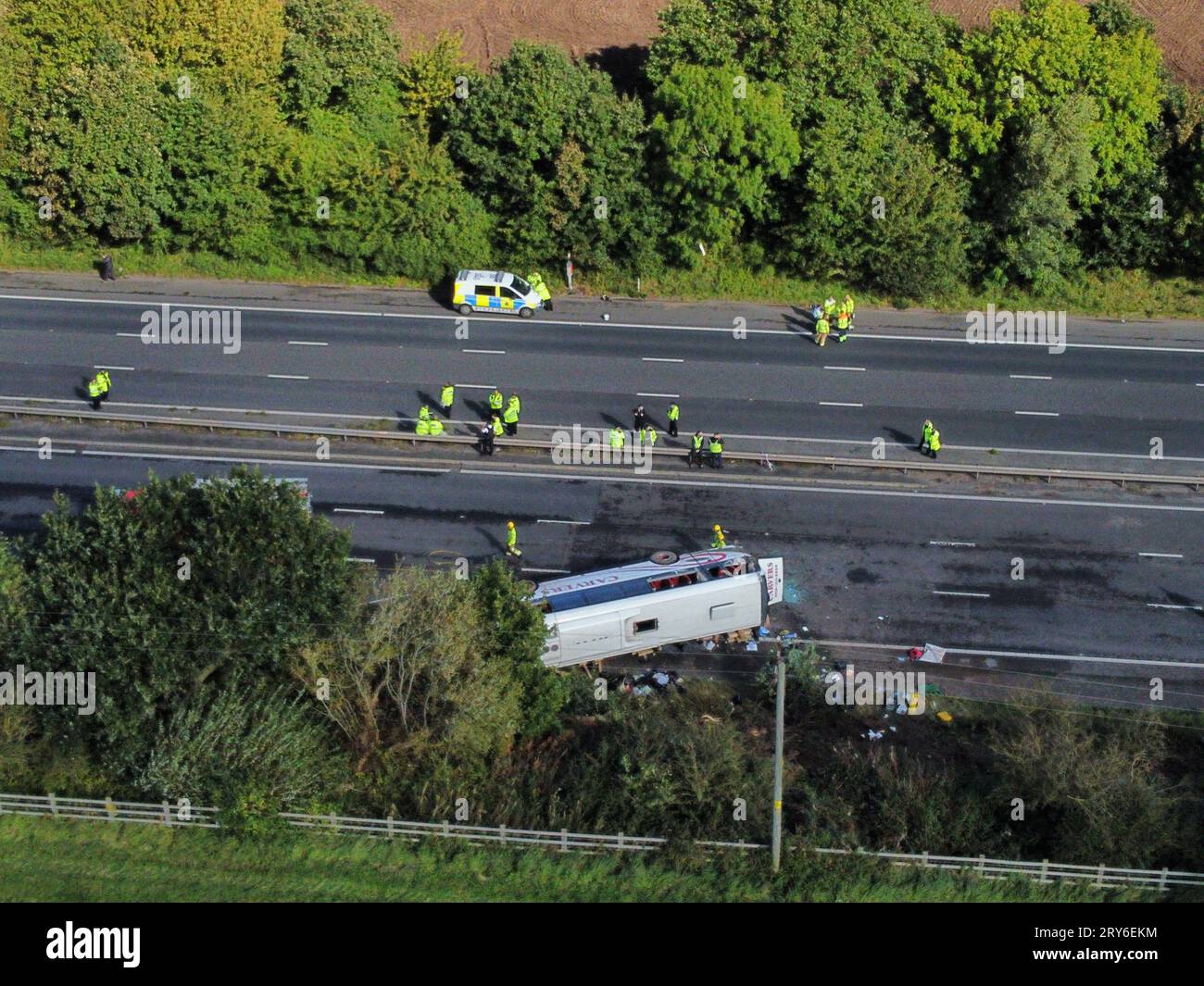 Emergency services at the scene of a coach crash on the M53 motorway ...