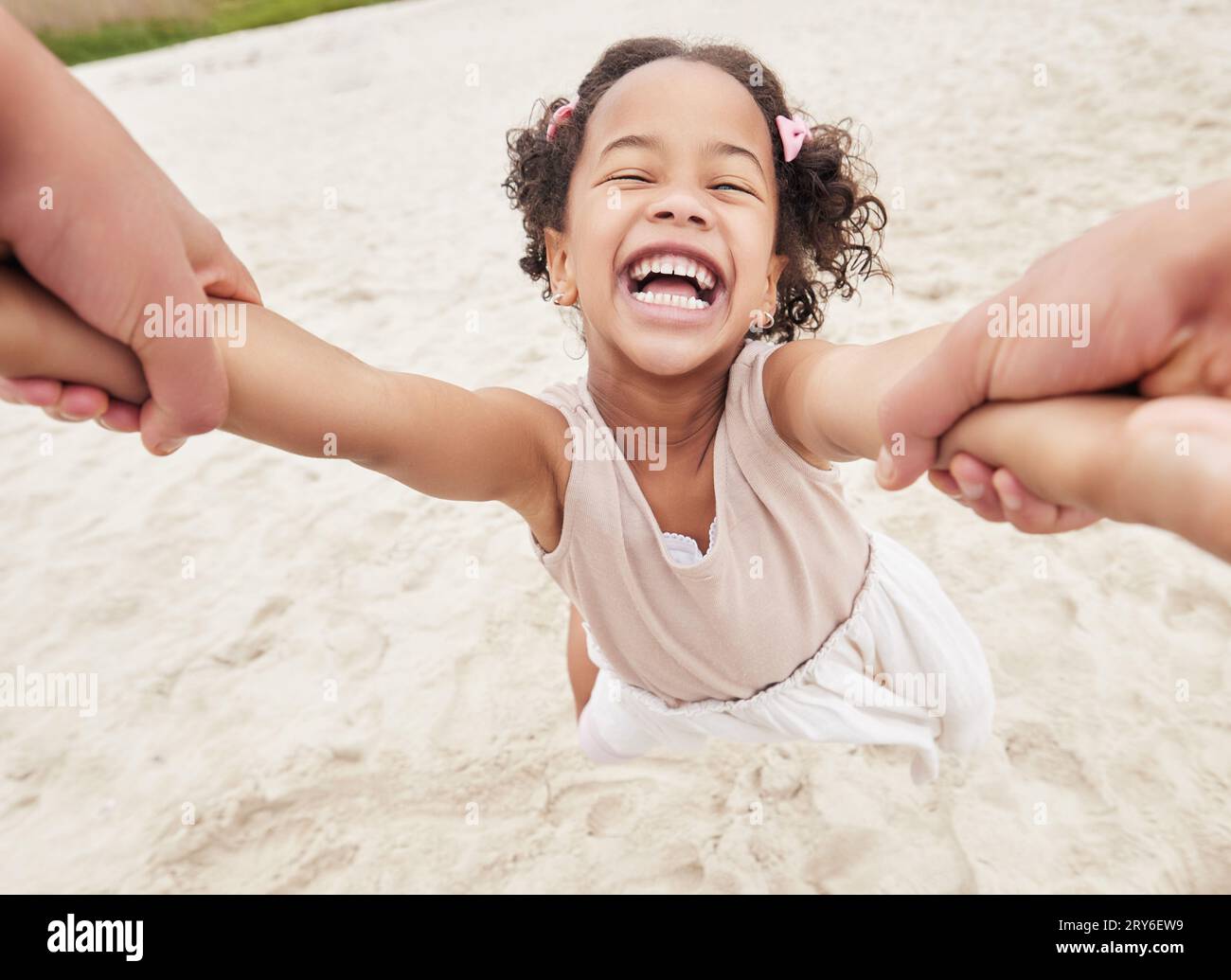 POV, parent spinning child in park and playing, laughing and spending ...