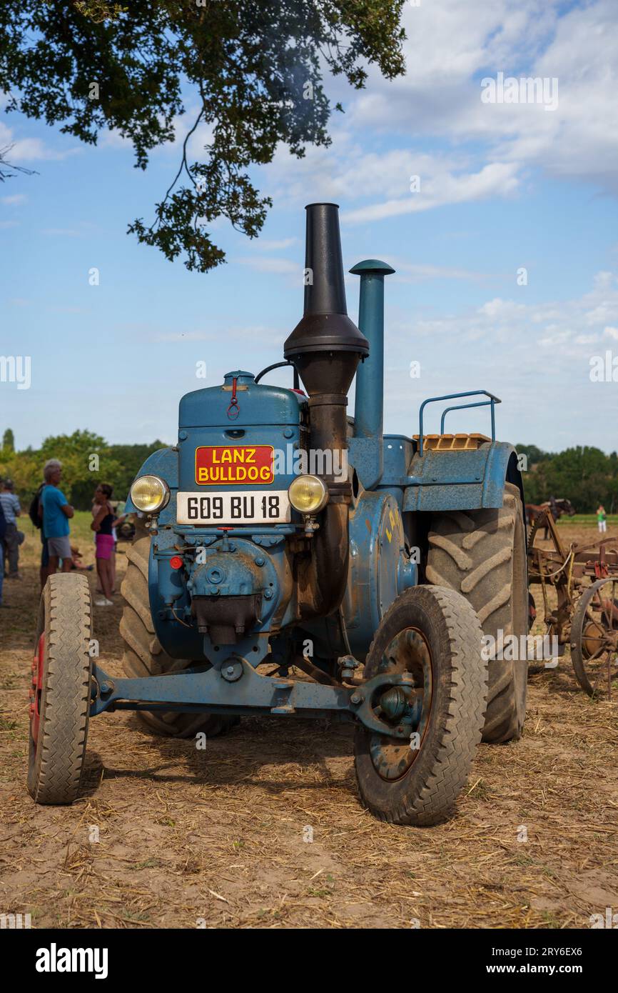 Vintage farming machinery on display at a harvest festival in France ...