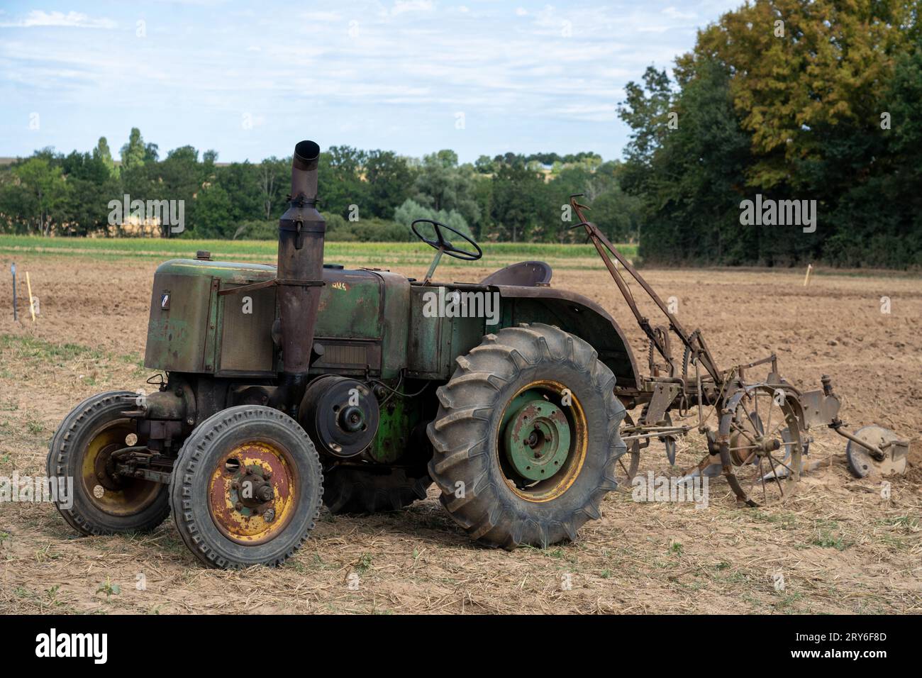 Vintage farming machinery on display at a harvest festival in France ...