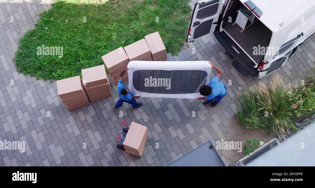 Mattress Delivery Truck. Movers Transporting And Shipping Stock Photo ...