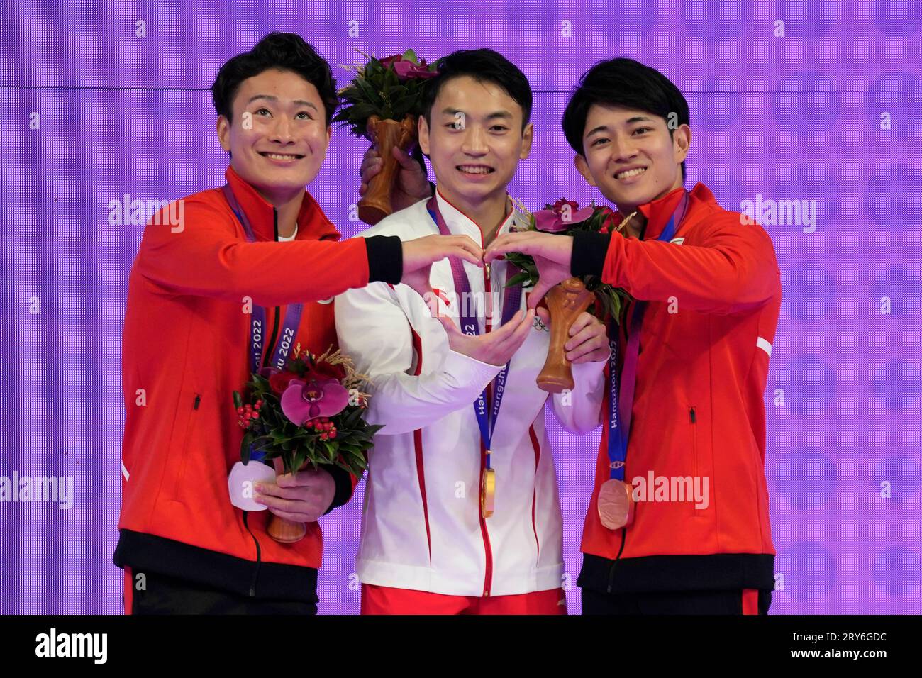 Gold medalist China's Jingyuan Zou, center, silver medalist Japan's ...
