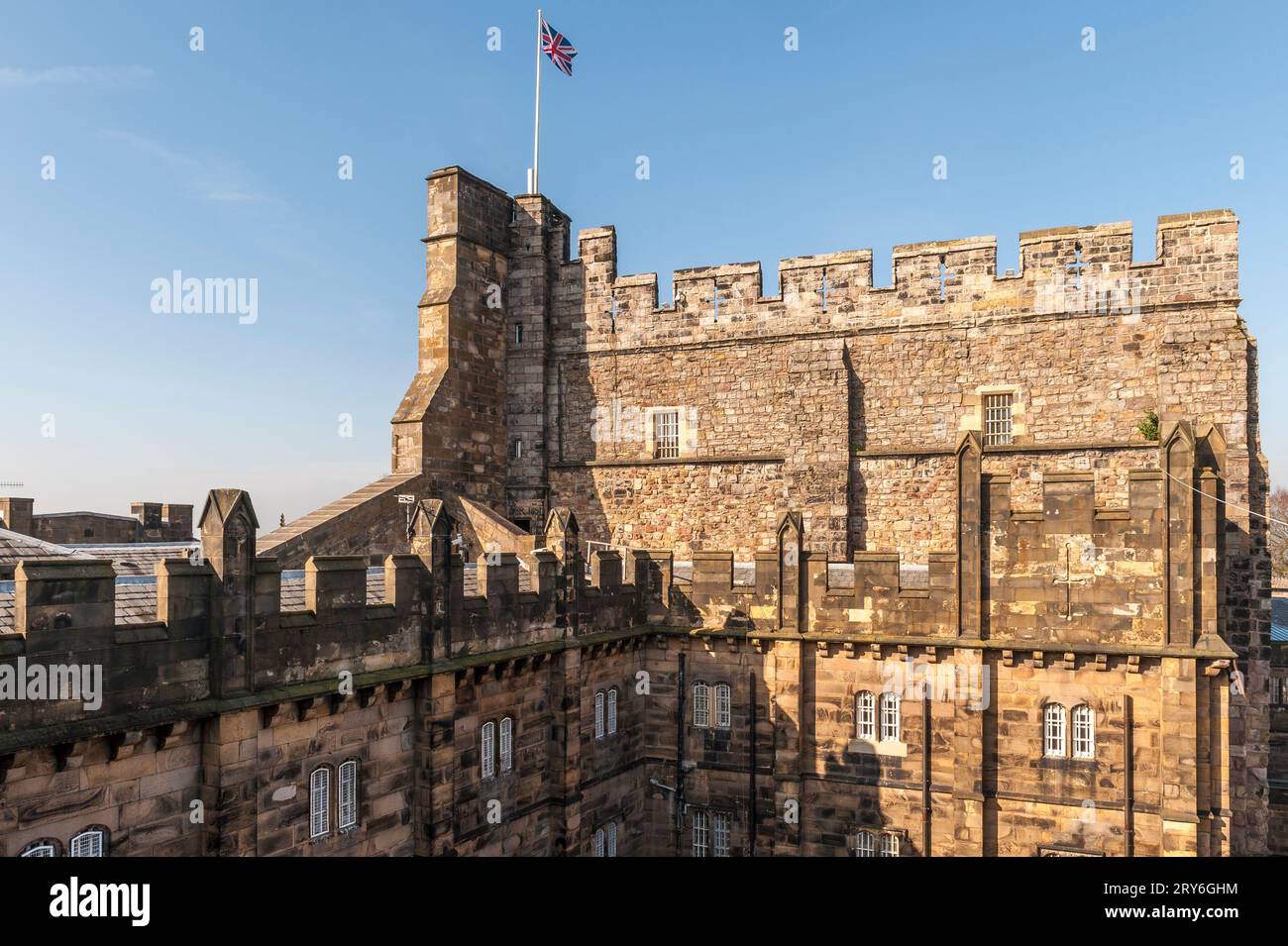 Lancaster Castle, Lancashire, UK. The Union Jack flag flying over the ...