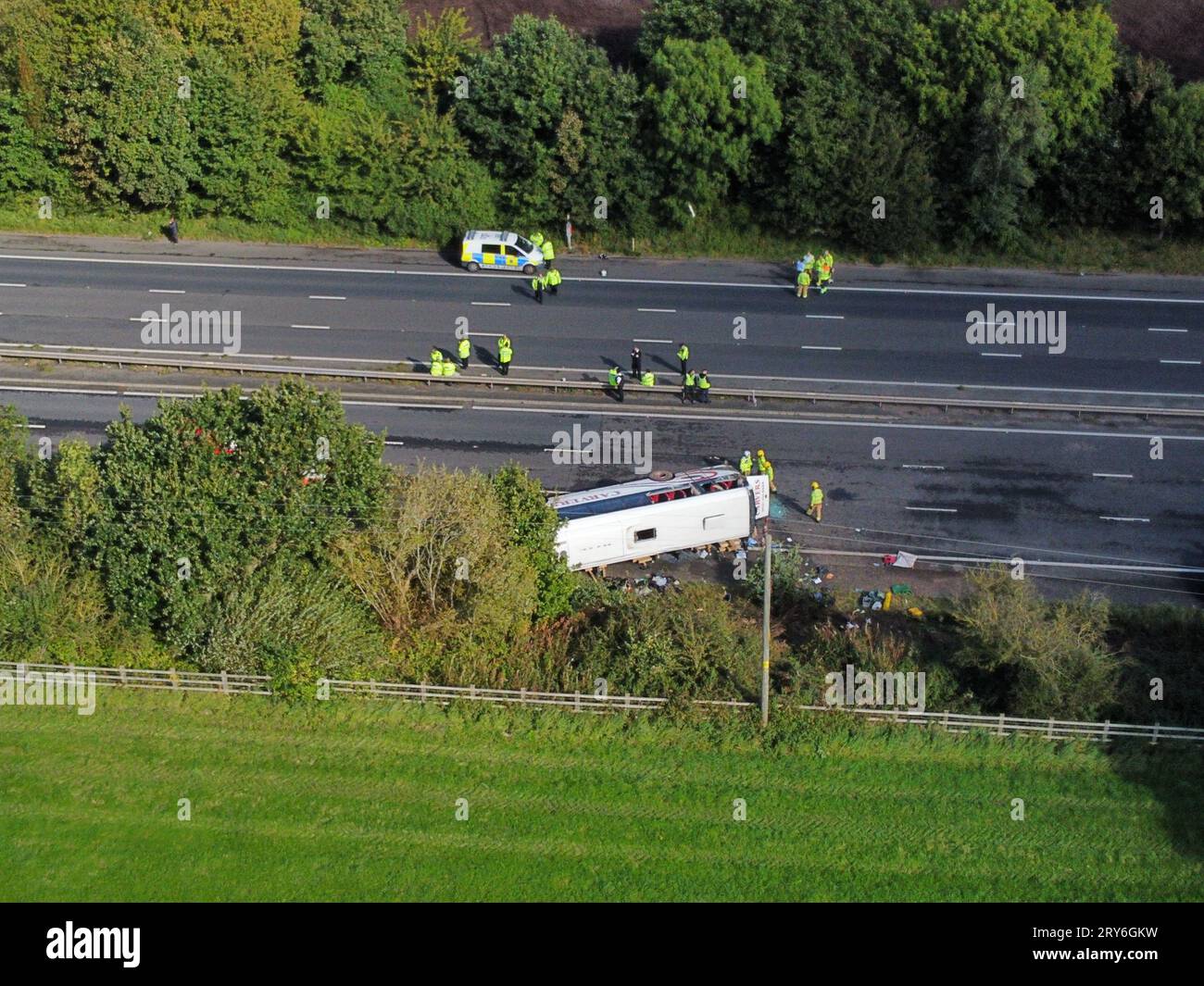 Emergency services at the scene of a coach crash on the M53 motorway ...