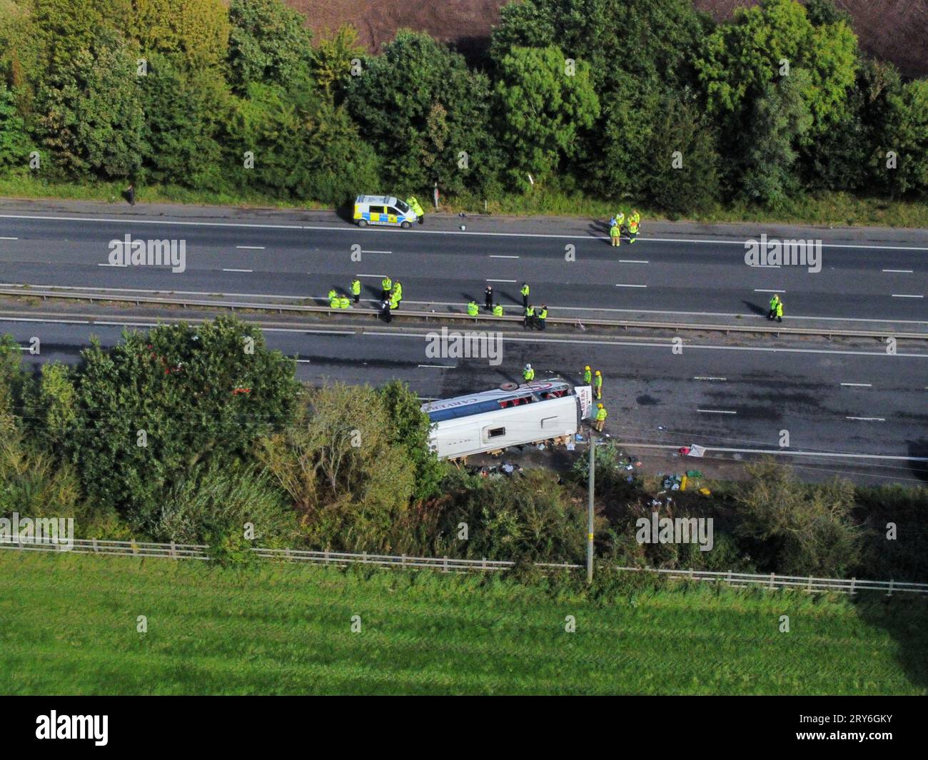 Emergency services at the scene of a coach crash on the M53 motorway ...