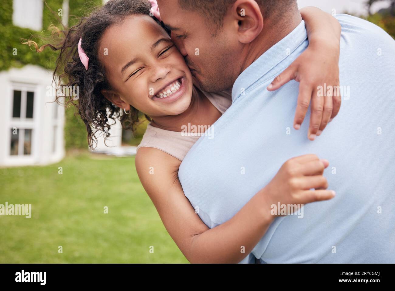 Hug, father and kiss kid on cheek outdoor at backyard of home for care ...