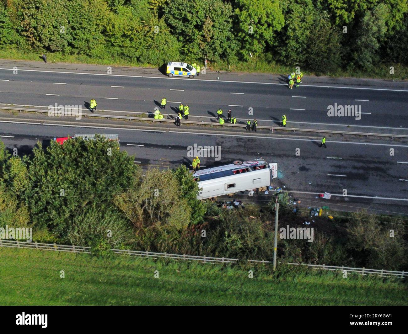 Emergency services at the scene of a coach crash on the M53 motorway ...