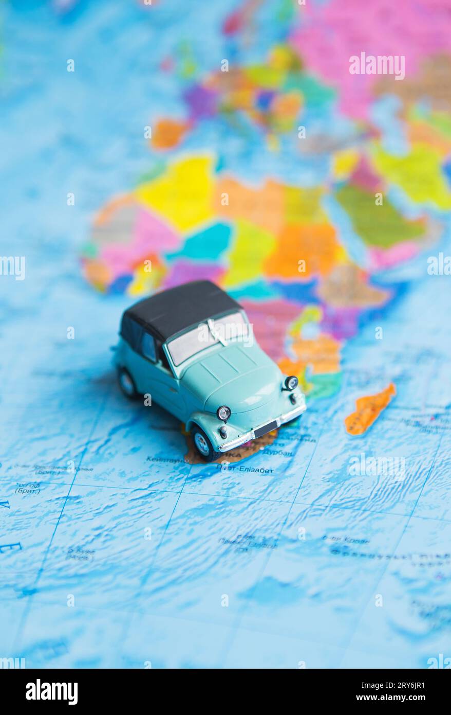 retro car on colorful world map, travel Stock Photo - Alamy