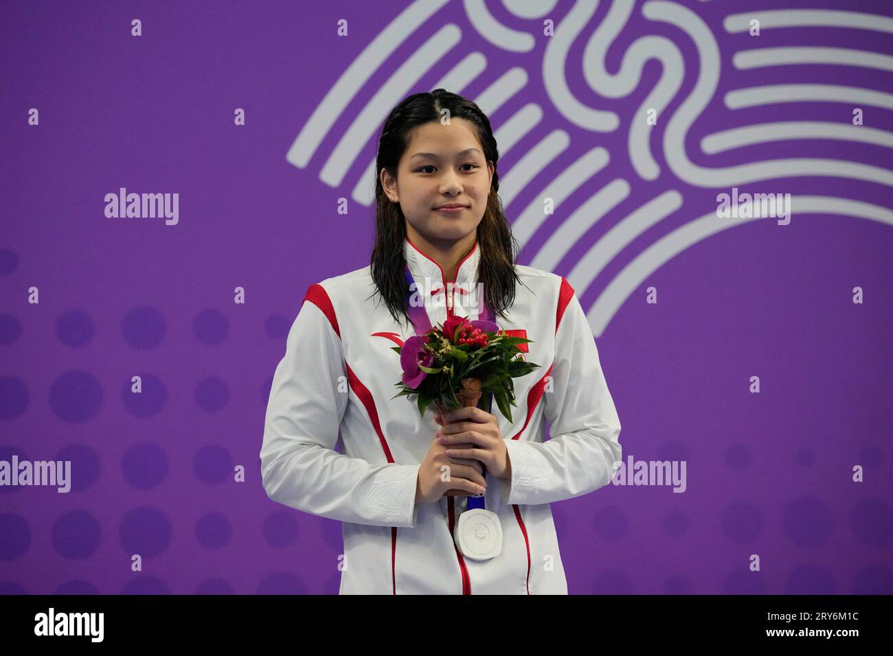 China's Yu Yiting celebrates after winning the silver medal in the ...