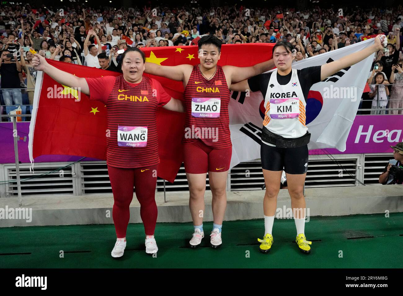 From left, gold medalist China's Wang Zheng, silver medalist China's ...