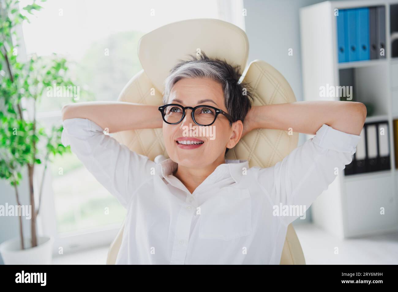 Photo of thinking smart business worker senior woman hands head take ...