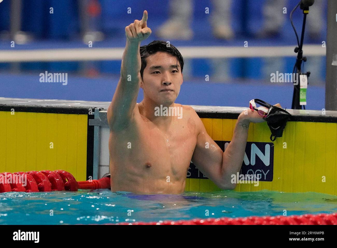 South Korea's Kim Woomin celebrates after winning the men's 400m ...