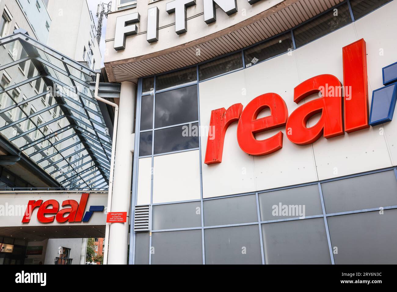 Cologne, Germany. 29th Sep, 2023. Logos hang above the entrance to a ...