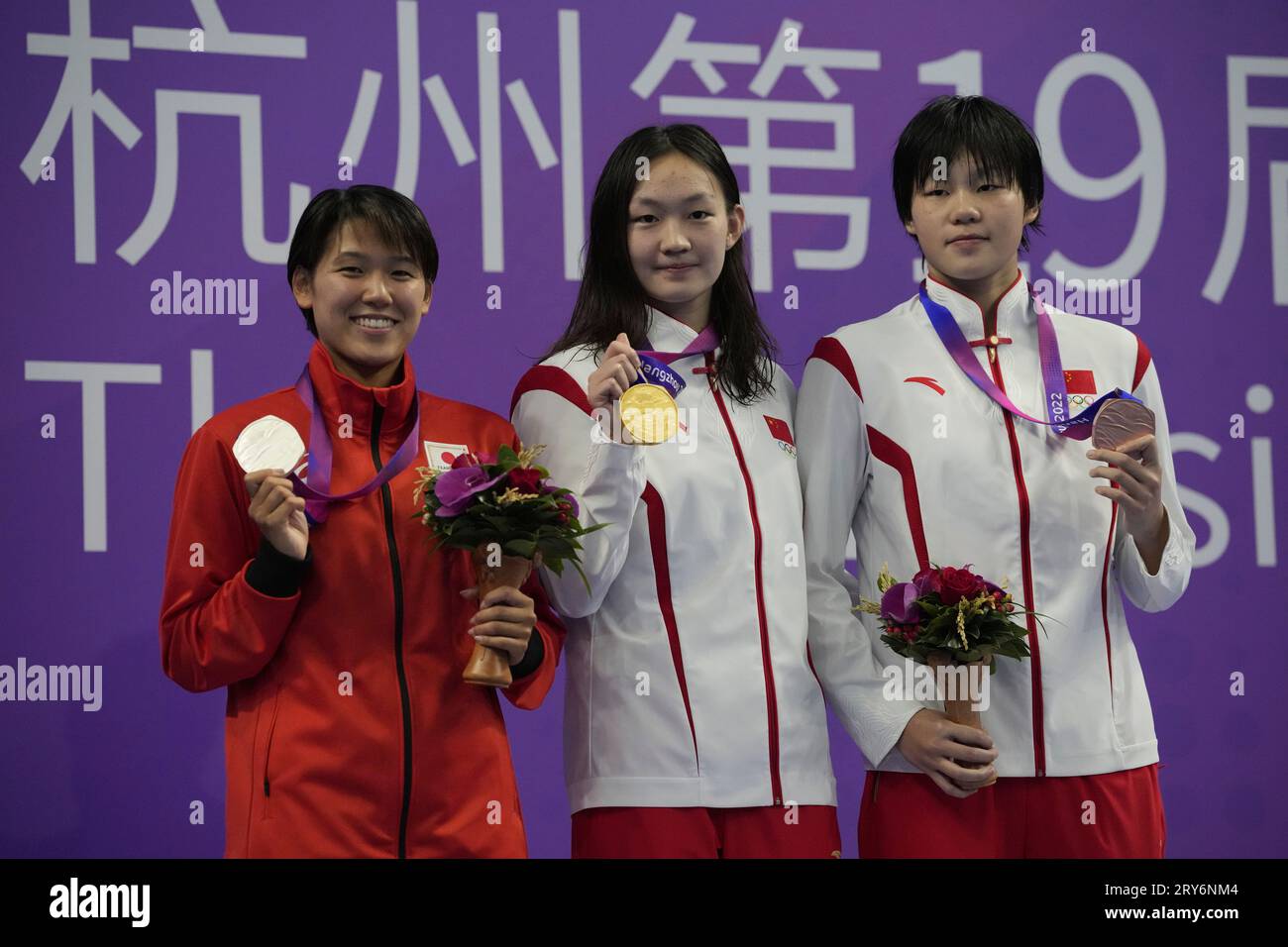 From left to right, silver medallist Japan's Waka Kobori, gold ...