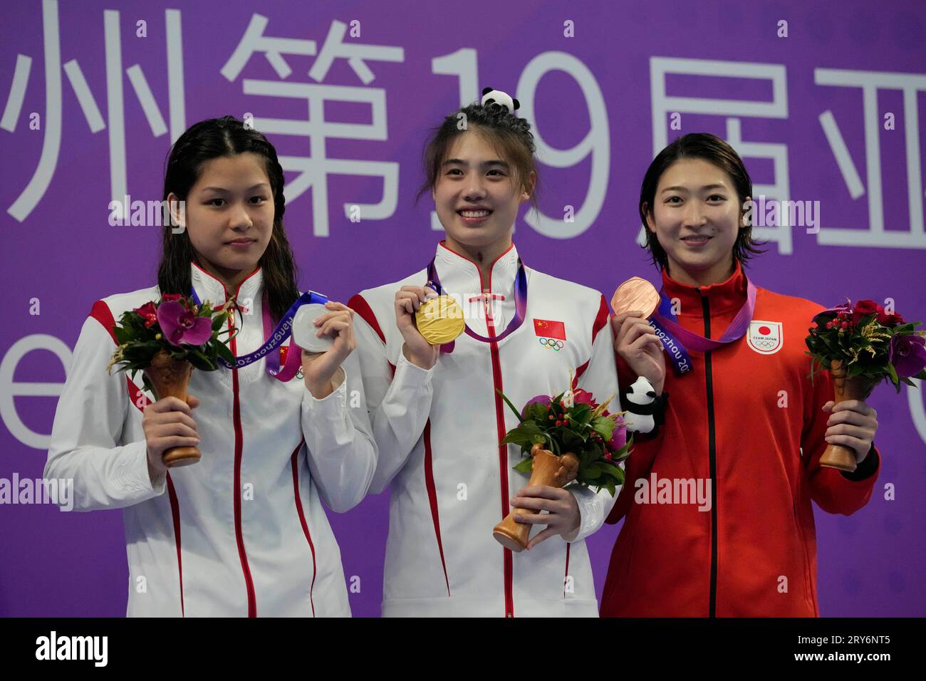 From left, silver medallist China's Yu Yiting, gold medallist China's ...