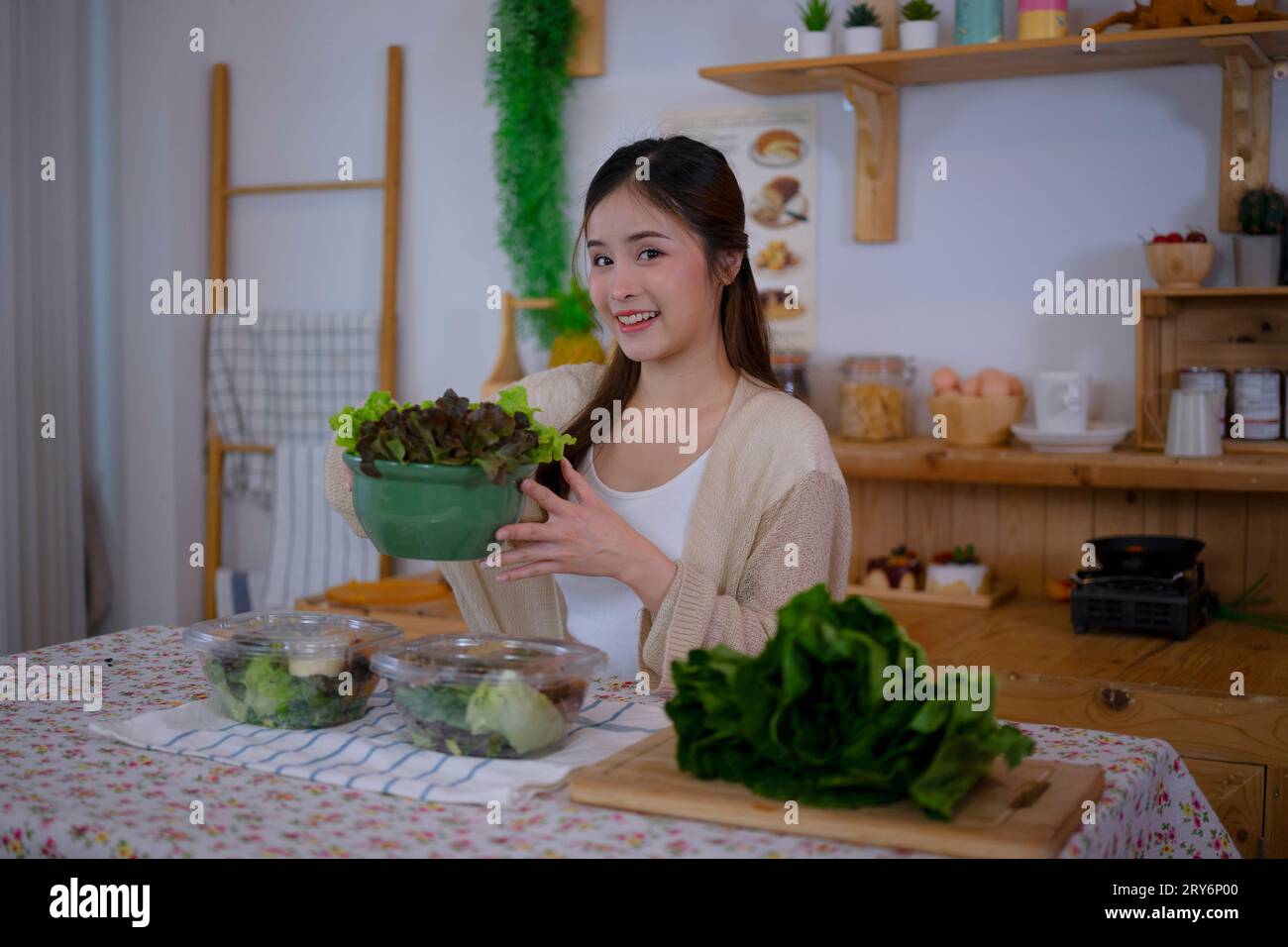 Pretty woman is livestreaming for sell healthy food. Vlogging and ...