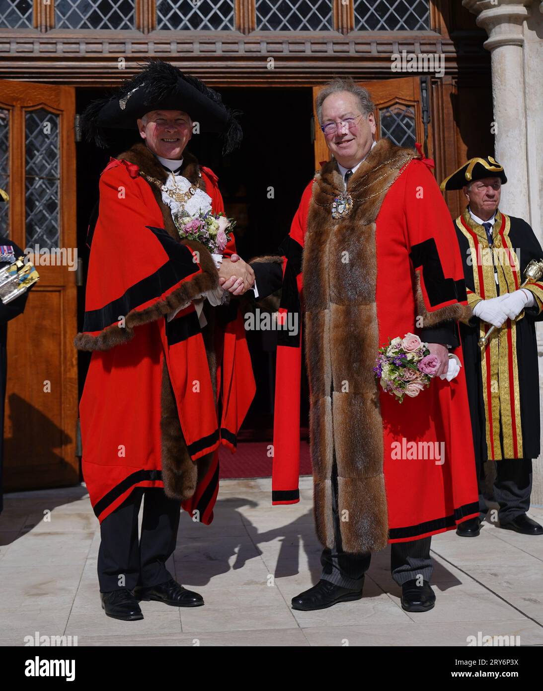 Outgoing Lord Mayor Nicholas Lyons (left) congratulates Alderman ...