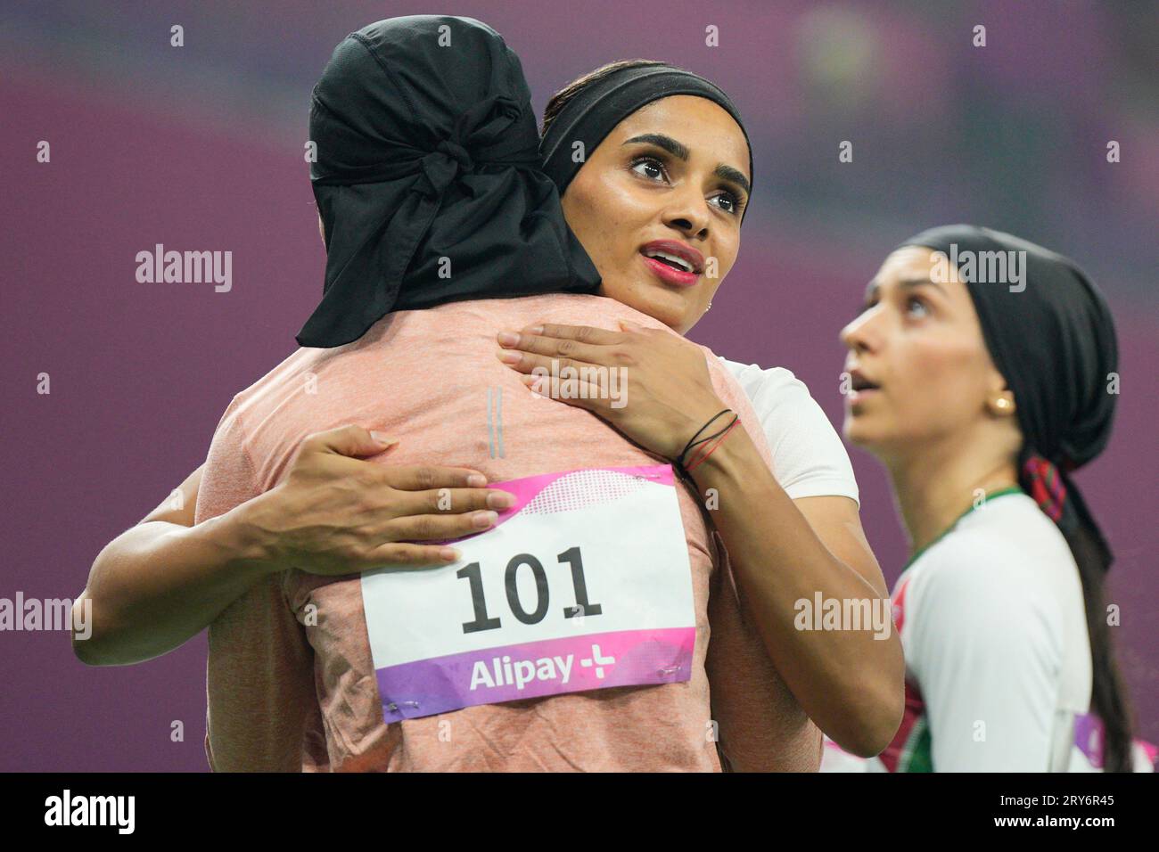 Bahrain's Hajar Saad Saeed Saad Alkhaldi hugs Afghanistan's Kima ...
