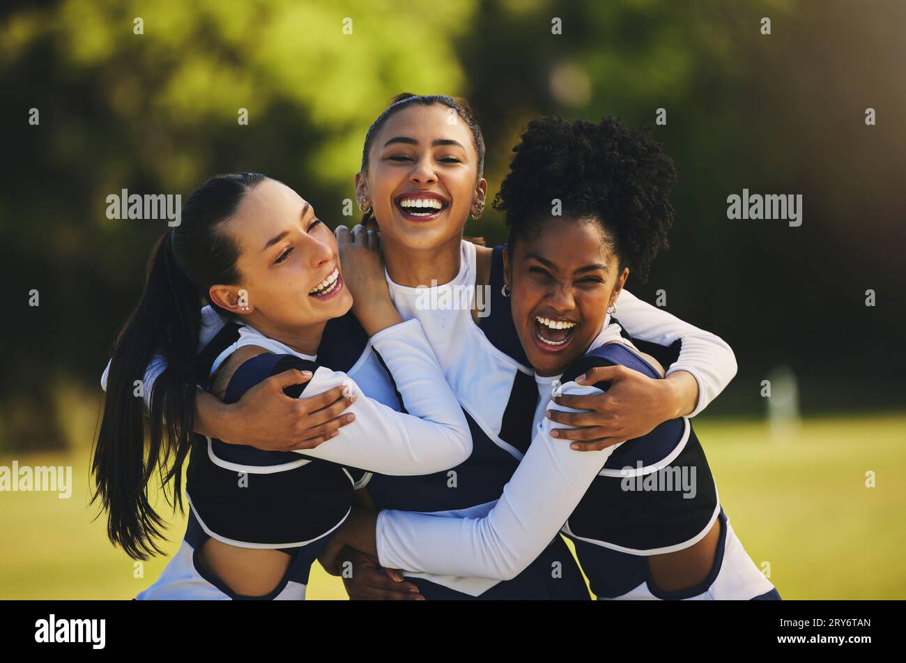 Teamwork, hug or portrait of cheerleader with people outdoor in ...
