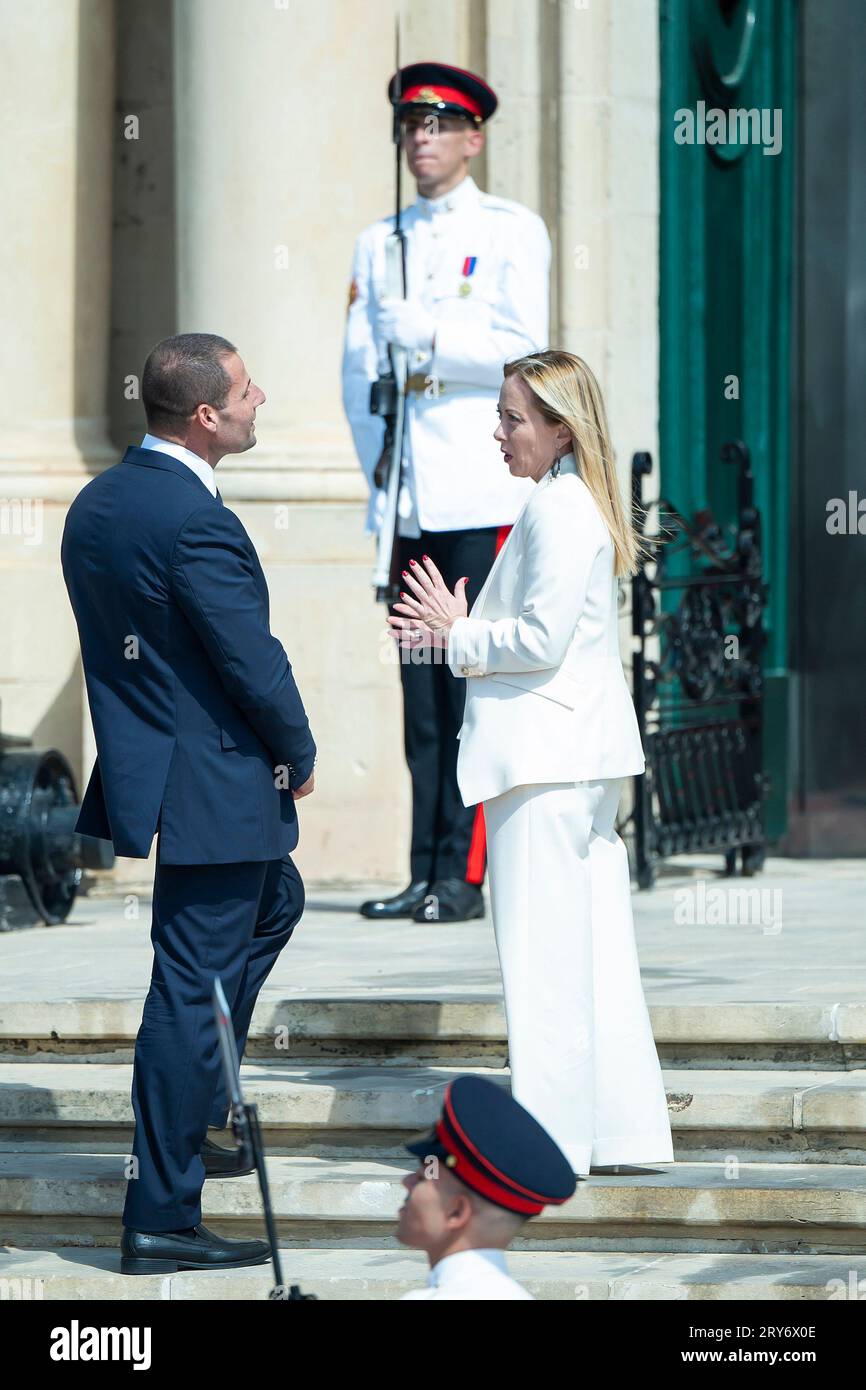 Italy's Prime Minister Giorgia arrives flanked by Malta's Prime ...