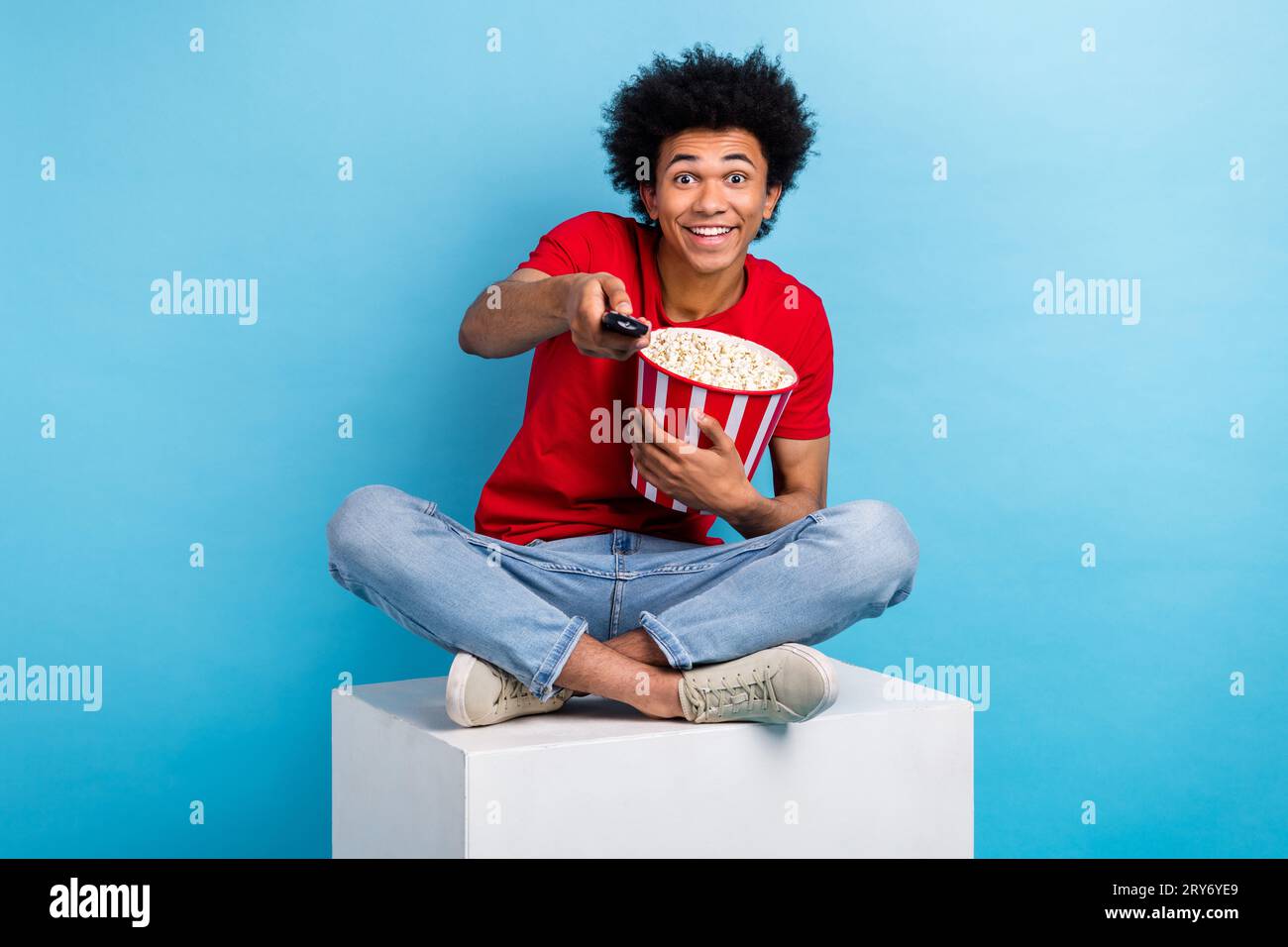 Full body cadre of crazy young man spend his holidays at home watch tv ...