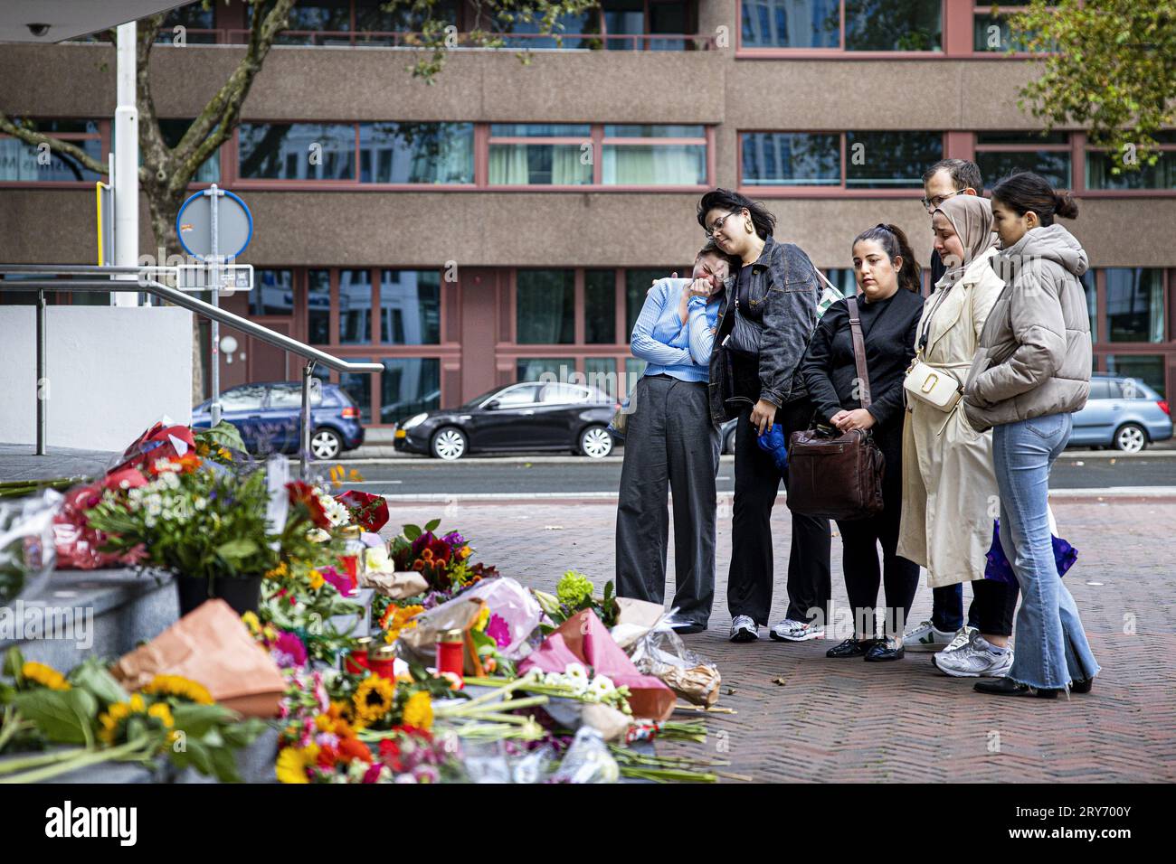 ROTTERDAM - Flowers on the sidewalk of the Erasmus MC, a day after two ...