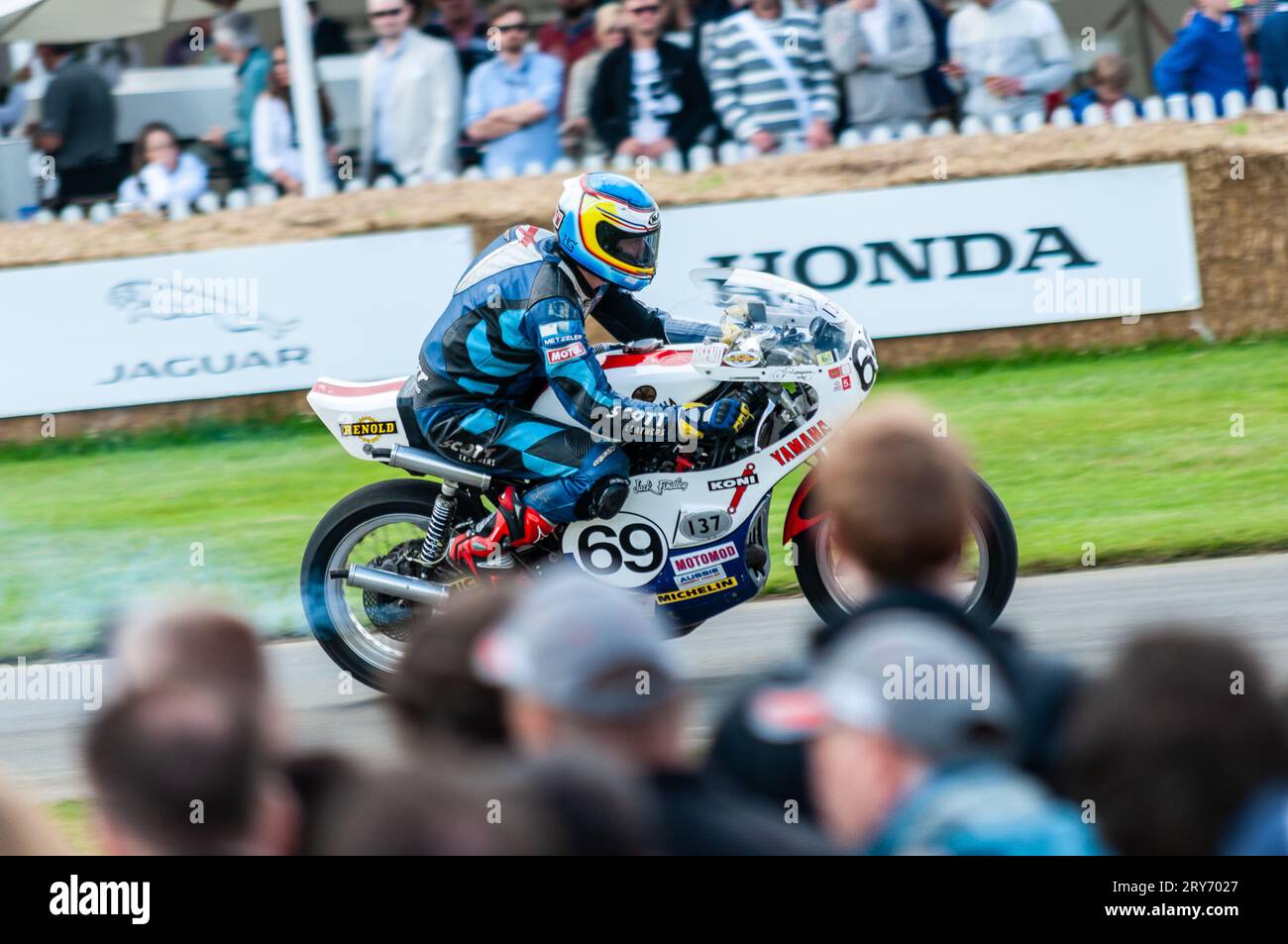 1970s Yamaha TZ750 racing up the hill climb at the Goodwood Festival of ...