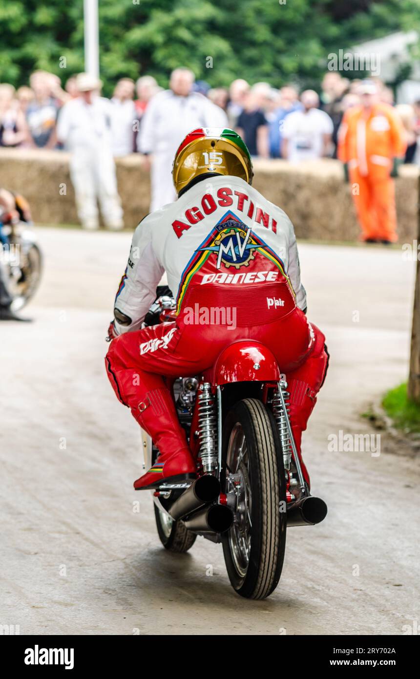 MV Agusta 500cc Three racing up the hill climb at the Goodwood Festival ...
