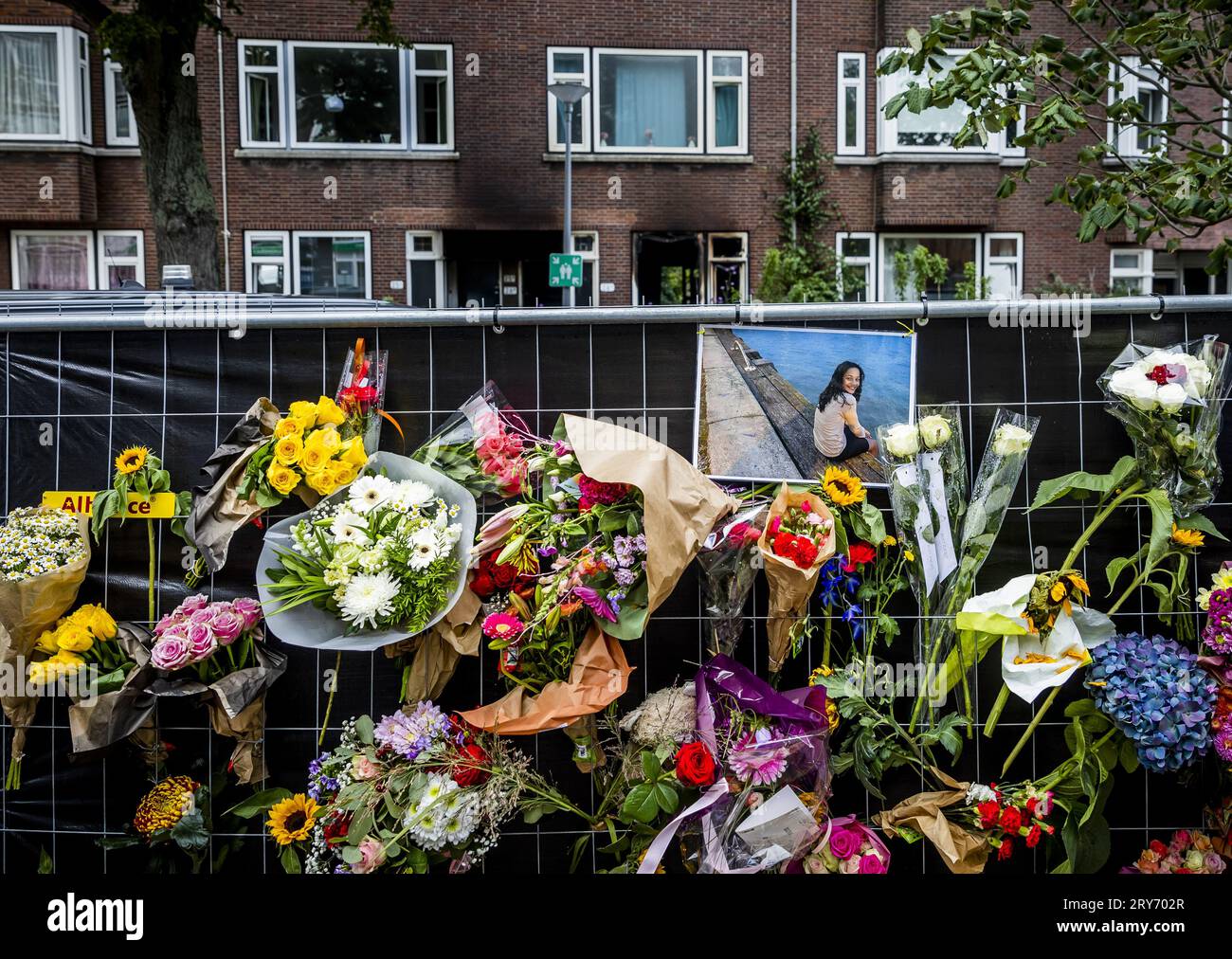 ROTTERDAM - Flowers at the building on Heiman Dullaertplein where a 39 ...