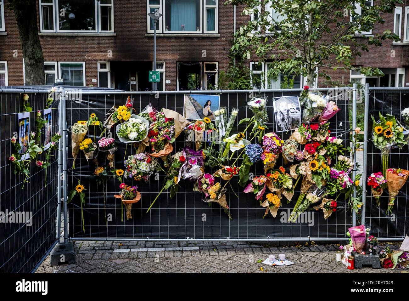ROTTERDAM - Flowers at the building on Heiman Dullaertplein where a 39 ...